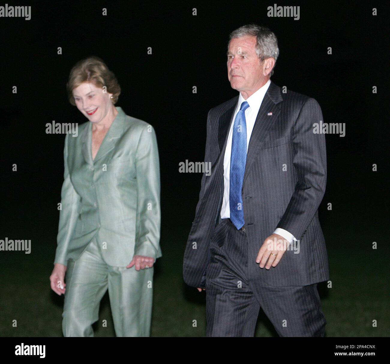 Returning from a five-day trip to the Middle East, President Bush and ...