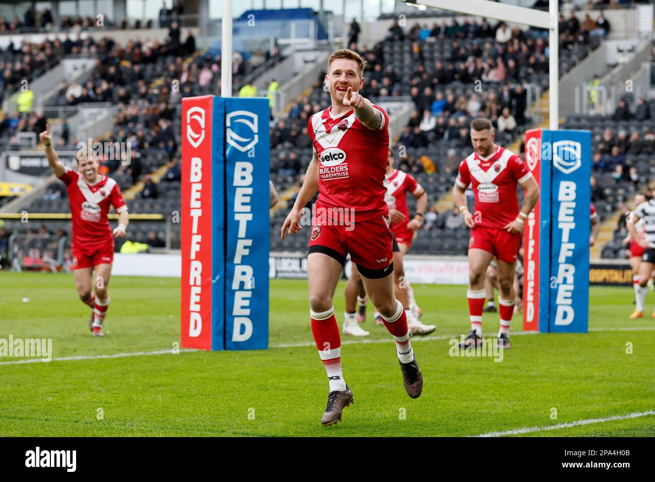 Salford Red Devils Marc Sneyd celebrates his try during the Betfred ...