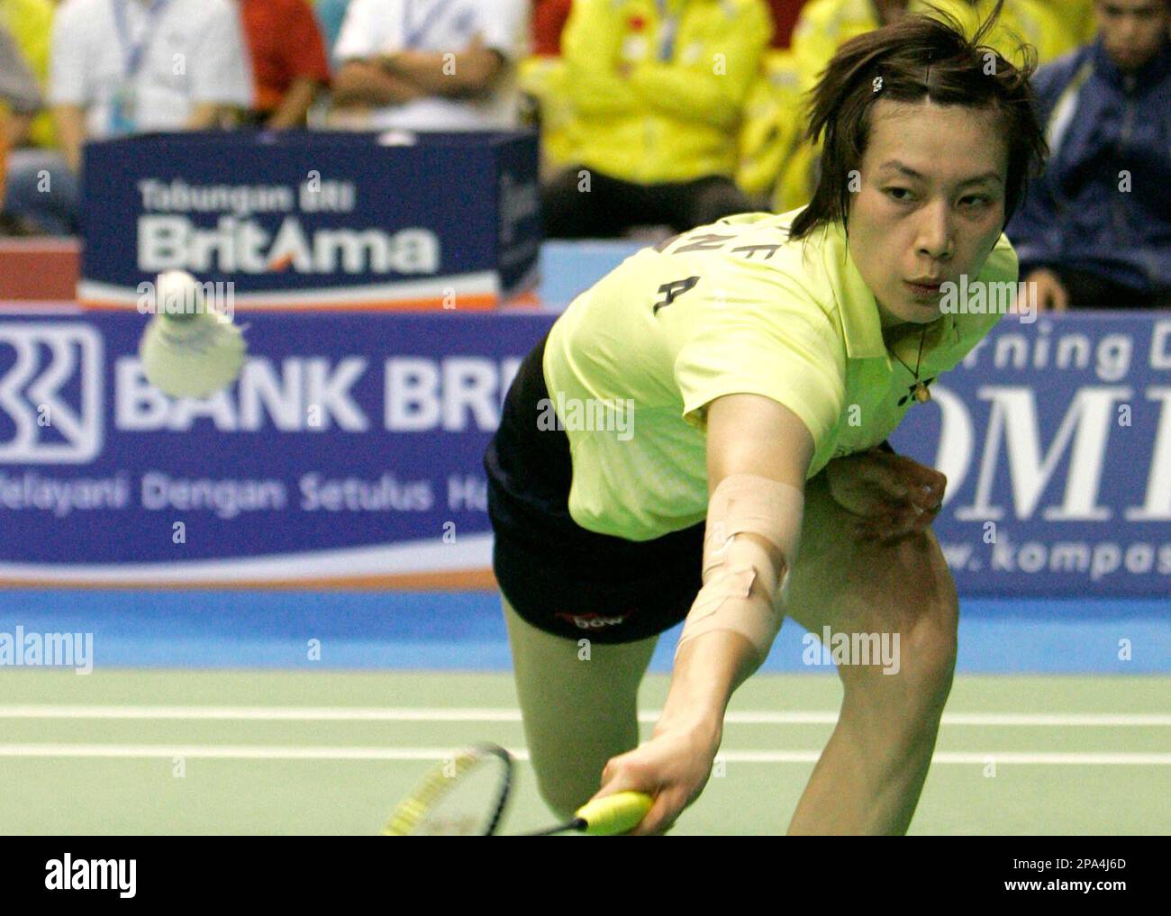 China's Xie Xinfang returns a shuttlecock against Maria Kristin of ...