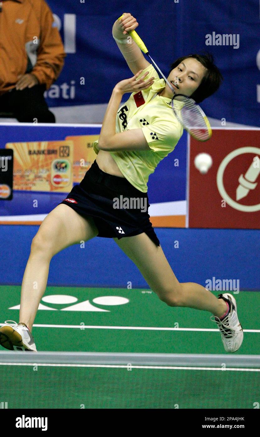 China's Xie Xinfang returns a shot to her opponent, Indonesia's Maria ...