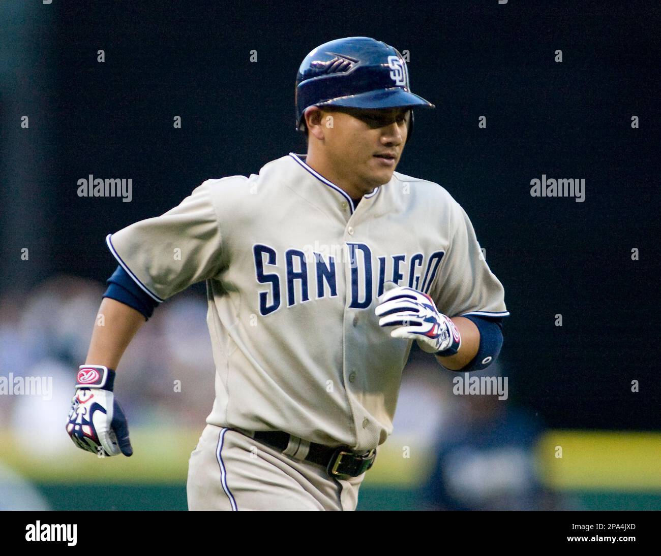 San Diego Padres' Tadahito Iguchi, of Japan, runs to third after ...