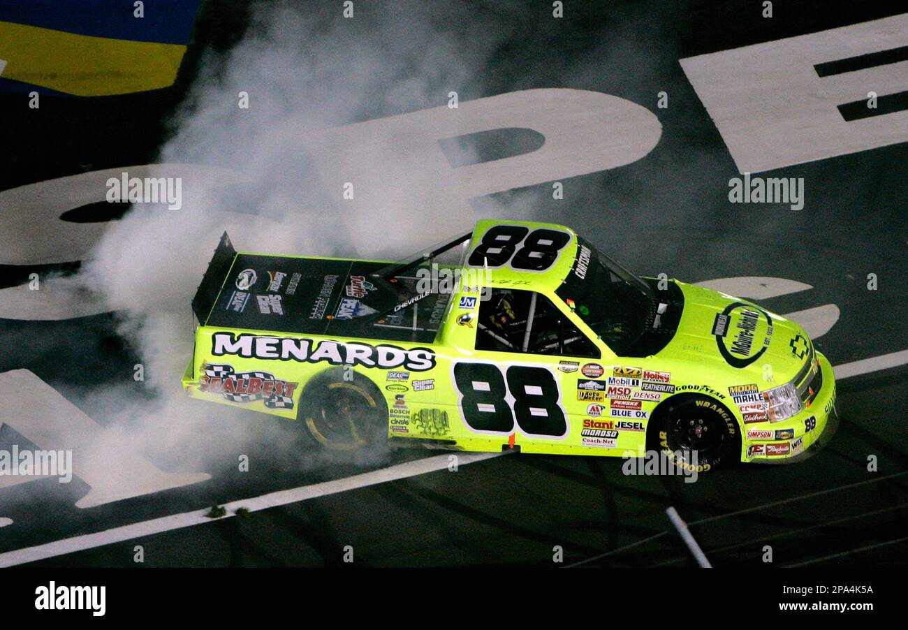 Matt Crafton does a burnout after winning the NASCAR Craftsman TruckS ...