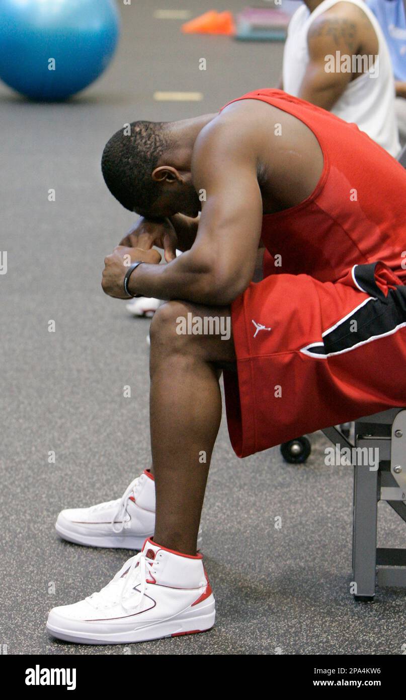 Miami Heat guard Dwyane Wade, takes a break as he works out at Attack ...