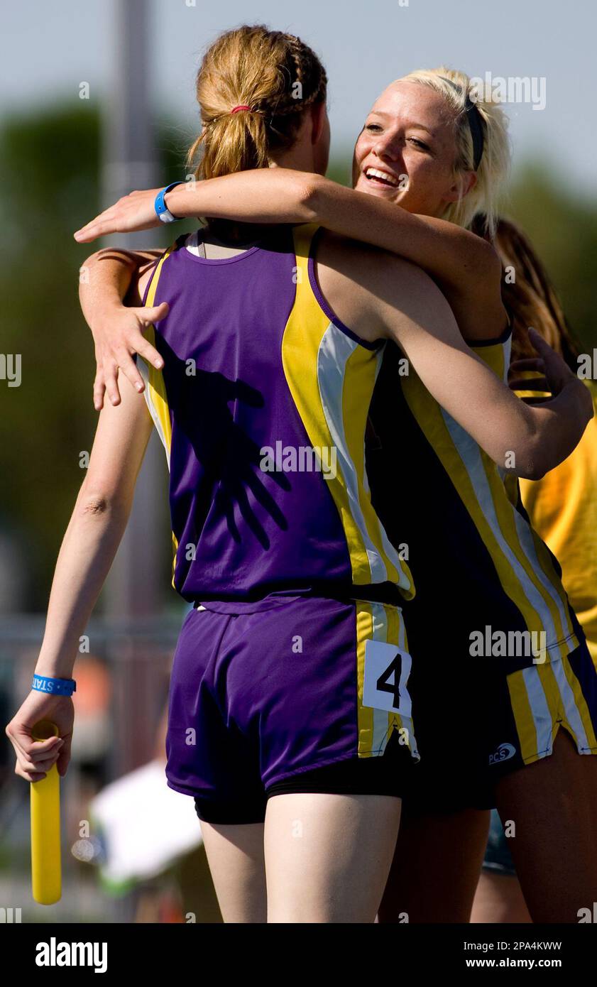 Logan-Magnolia's Jessica Steinkamp, right, hugs teammate Megan Hutson ...
