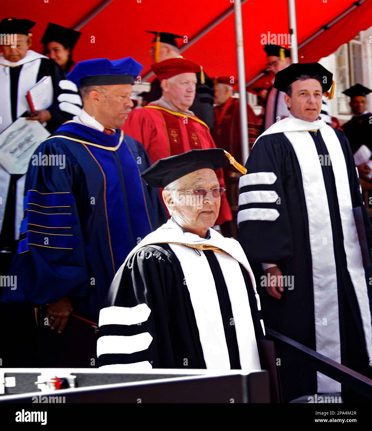 Walt Disney CEO Robert Iger, right, and Norman Lear, foreground ...