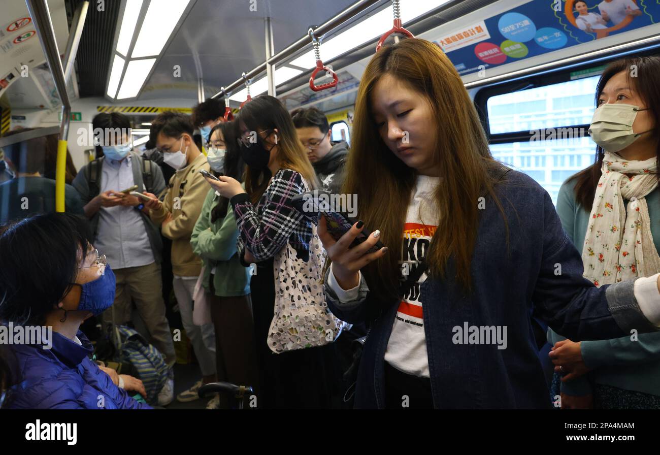 MTR commuters are pictured on the first day of government lifting all ...