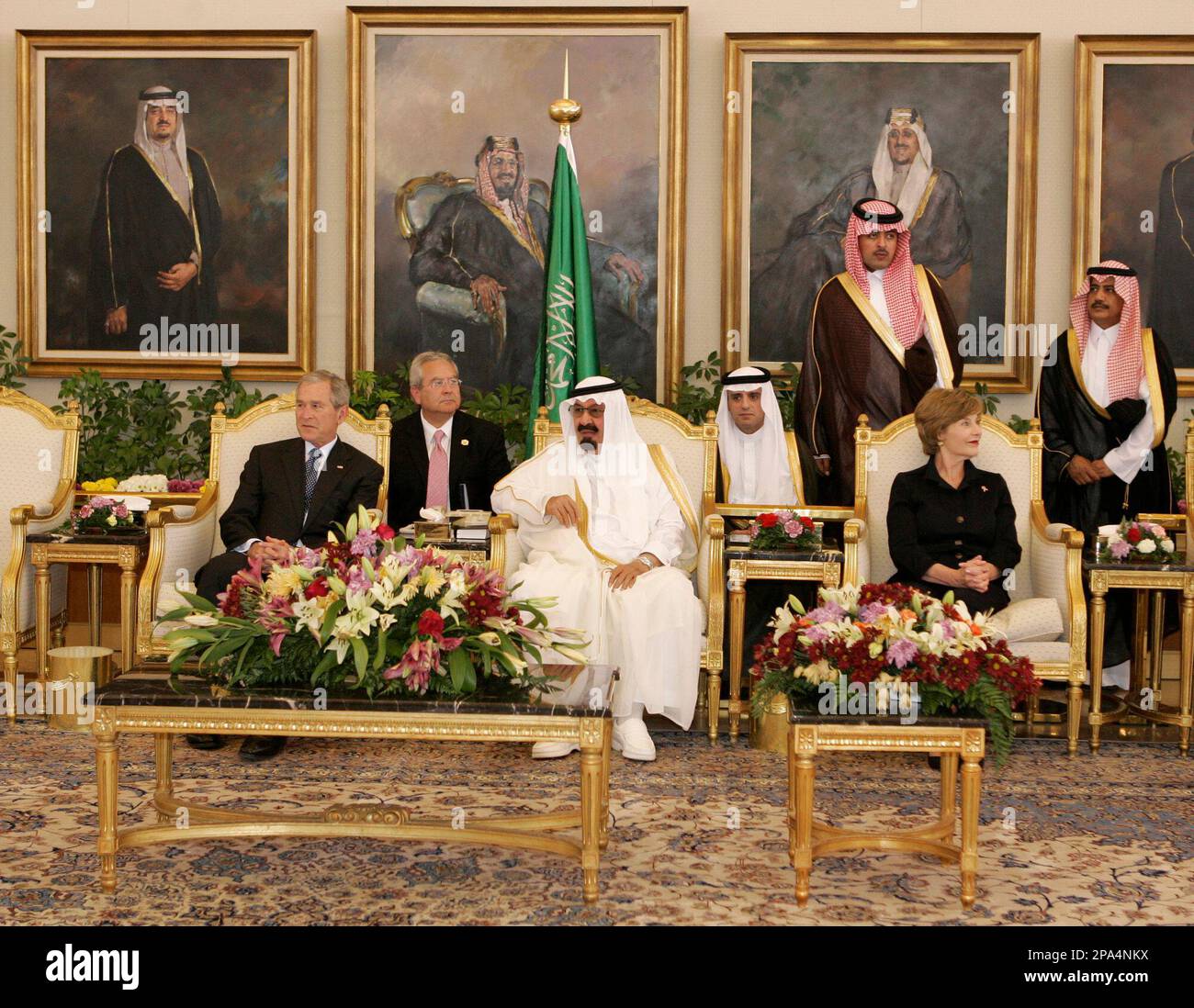 U.S. President Bush and first lady Laura Bush sit with Saudi King ...