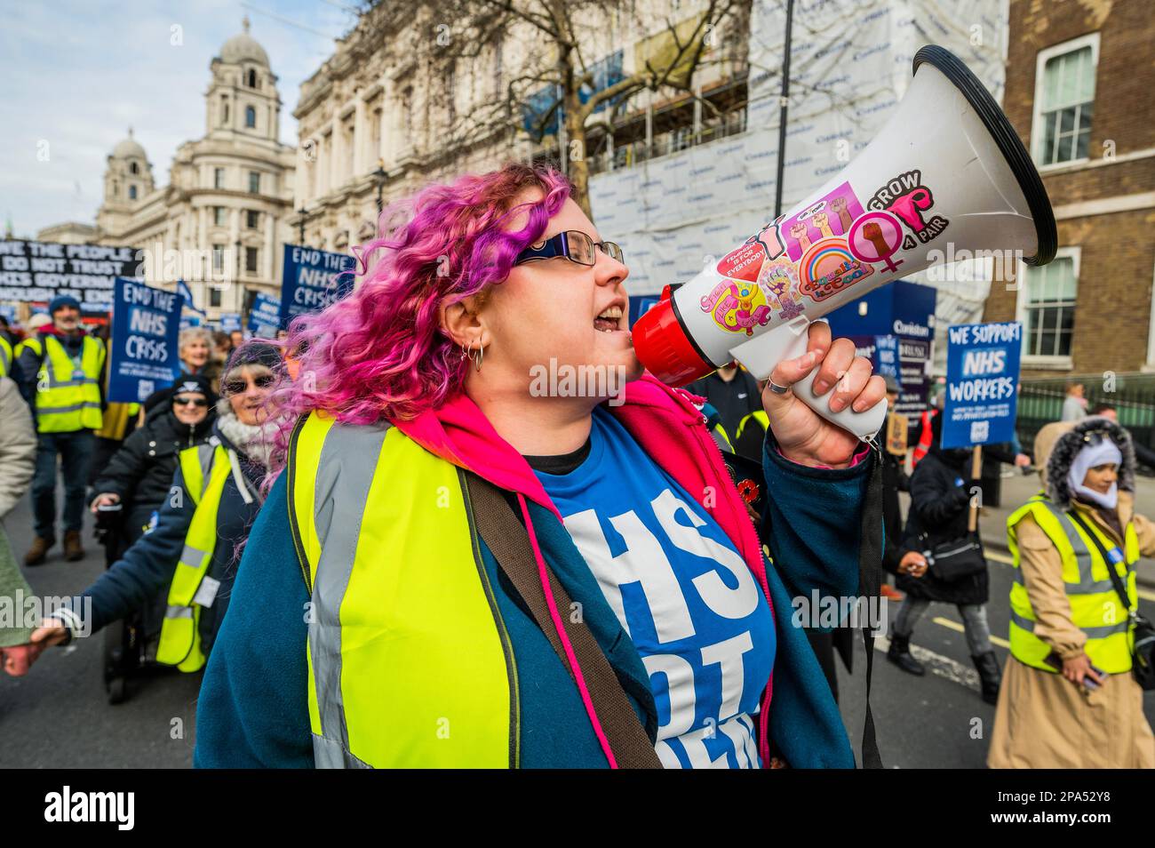 London, UK. 11th Mar, 2023. Marching down Whitehall - Save our NHS ...