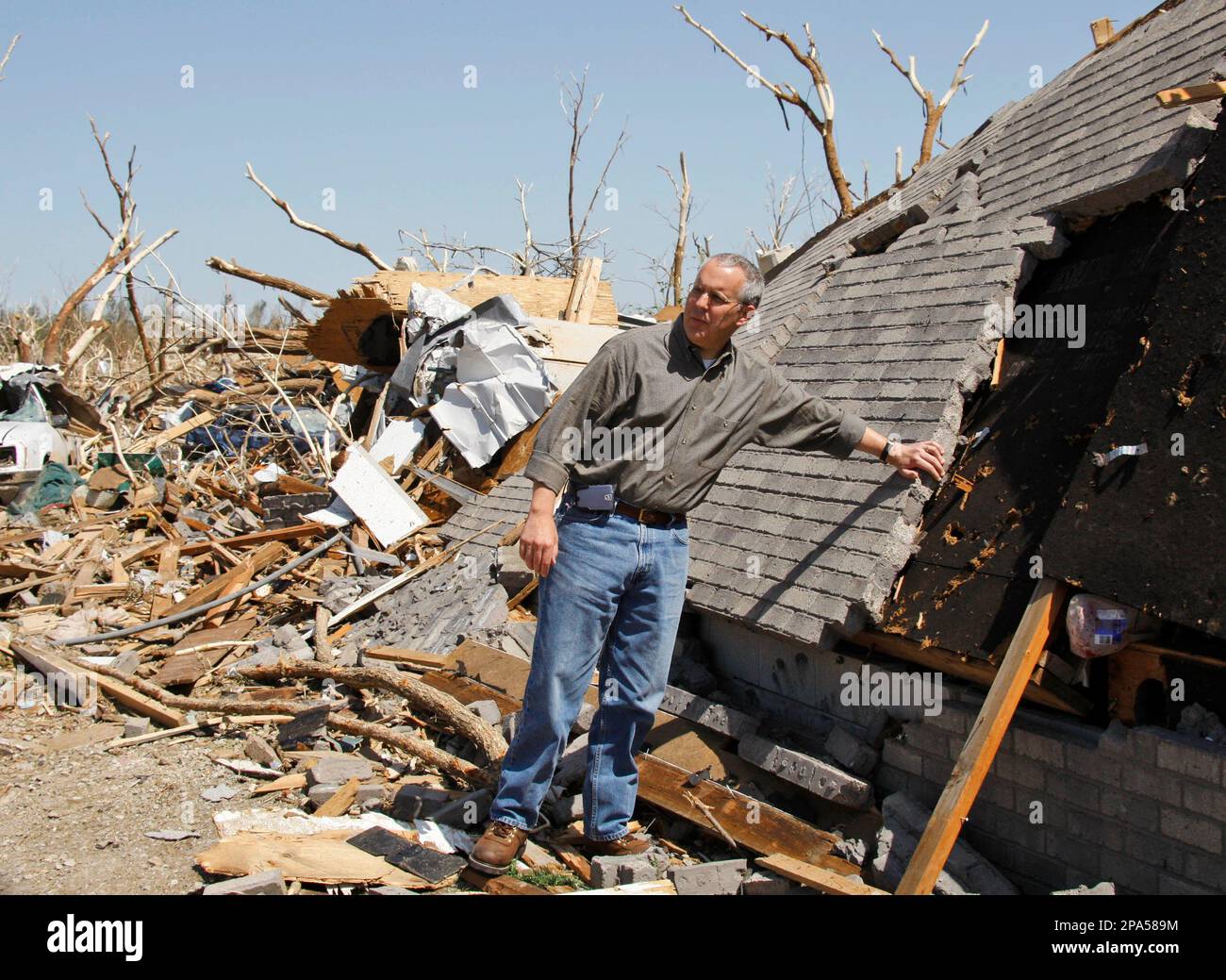 Oklahoma Gov. Brad Henry surveys the tornado damage in Picher, Okla ...