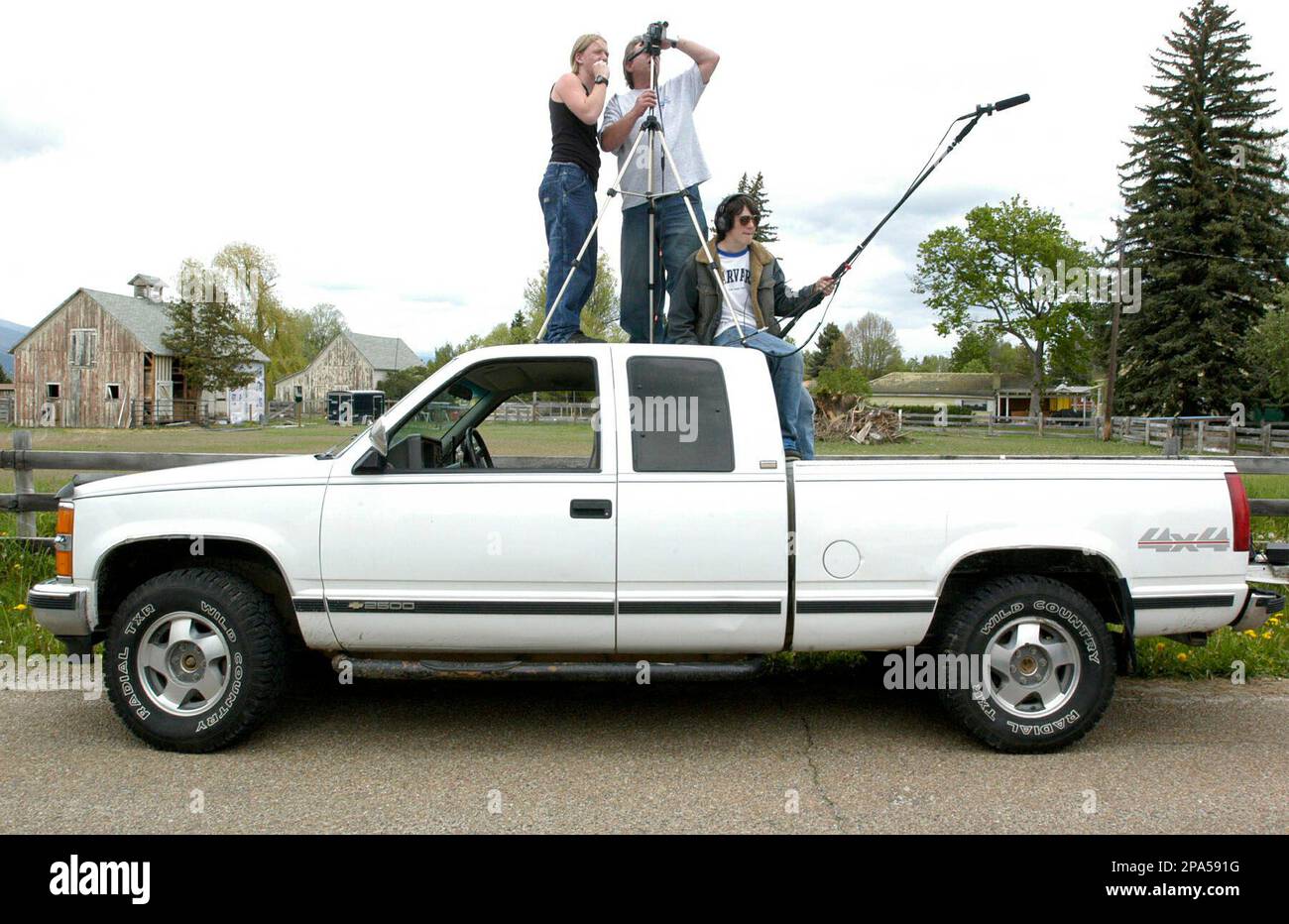 Students Jesse Barteaux, standing left, and Joe Barowy join retired ...