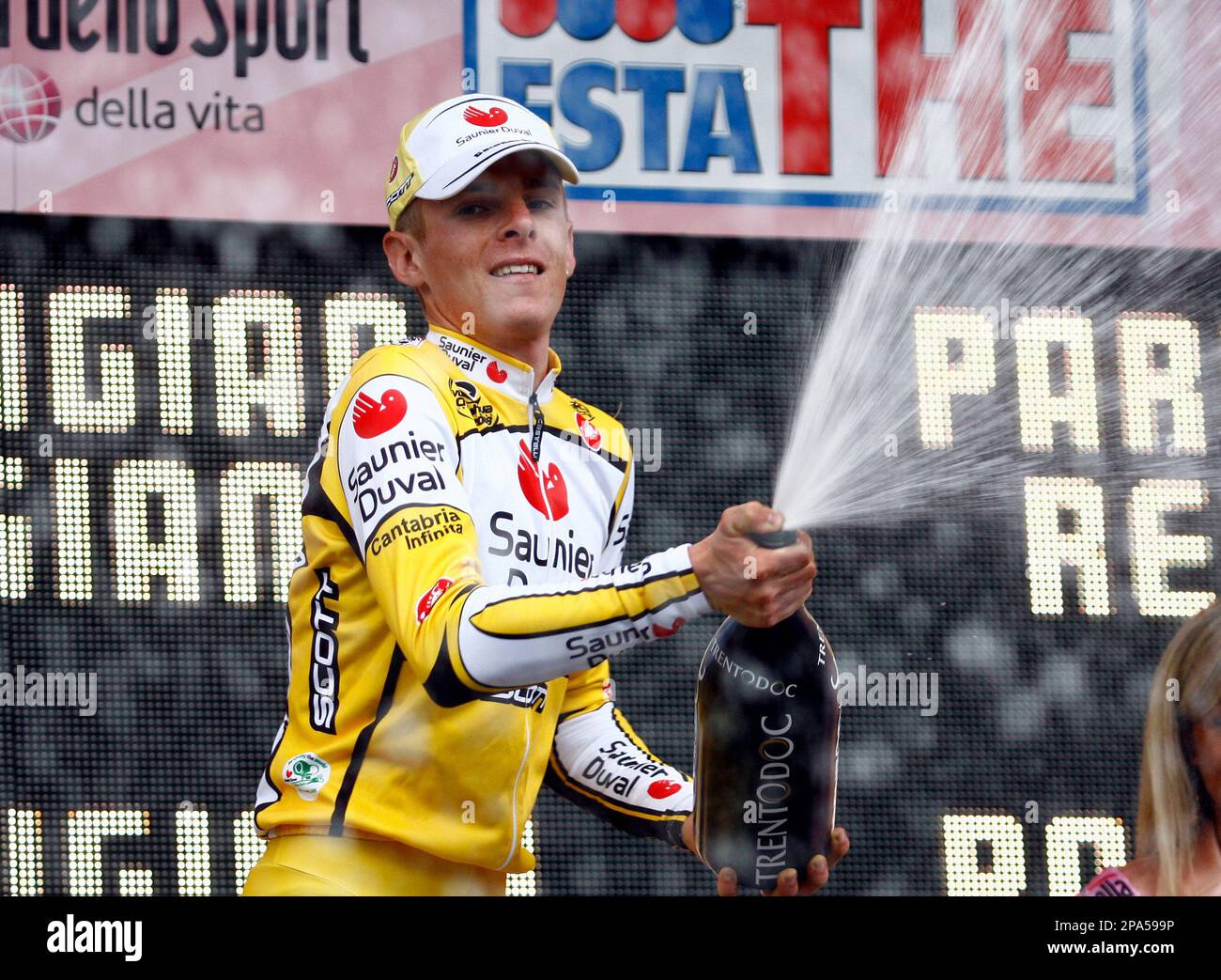 Italy's Riccardo Ricco' celebrates on the podium after winning the ...