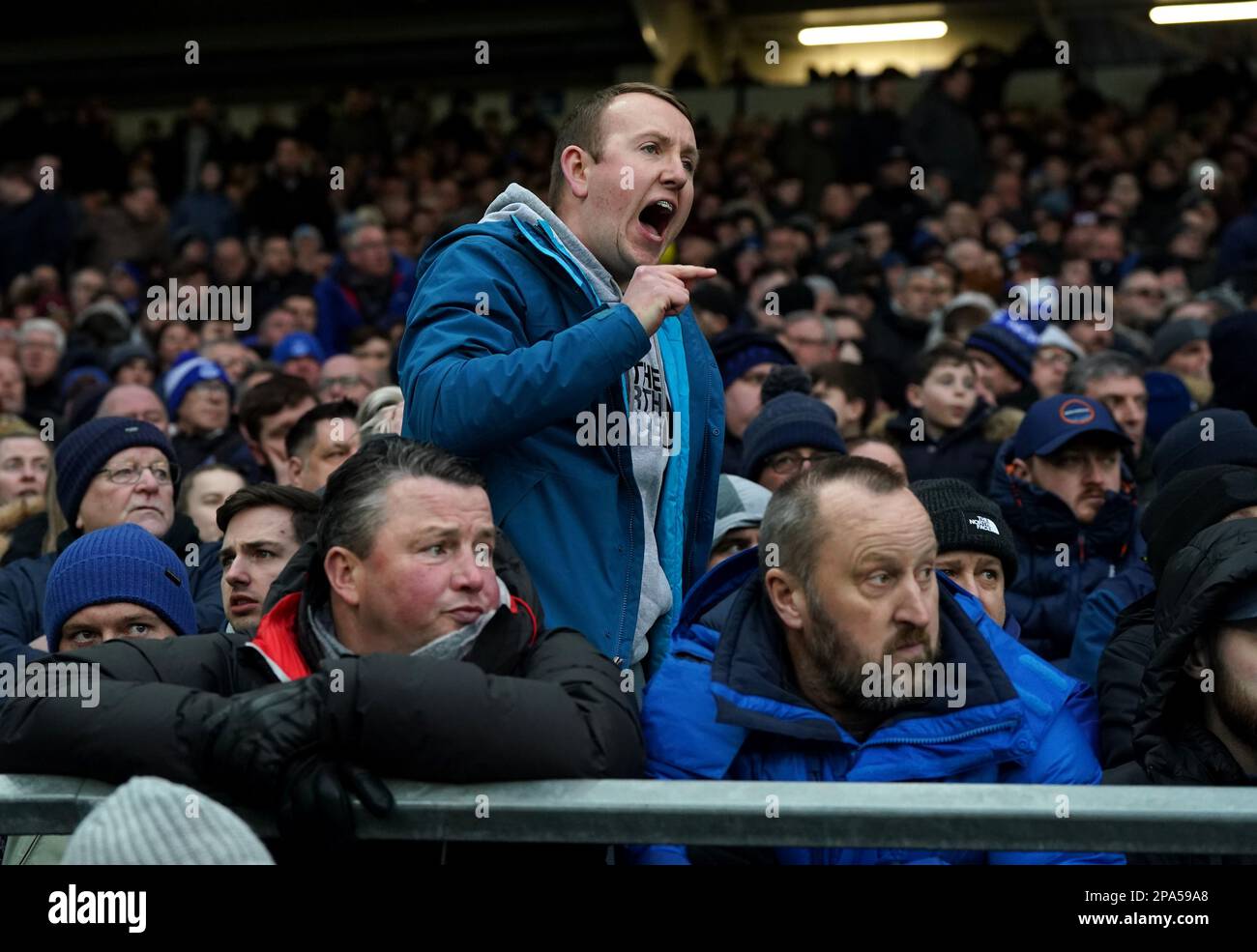 An Everton fan looks dejected during the Premier League match at ...