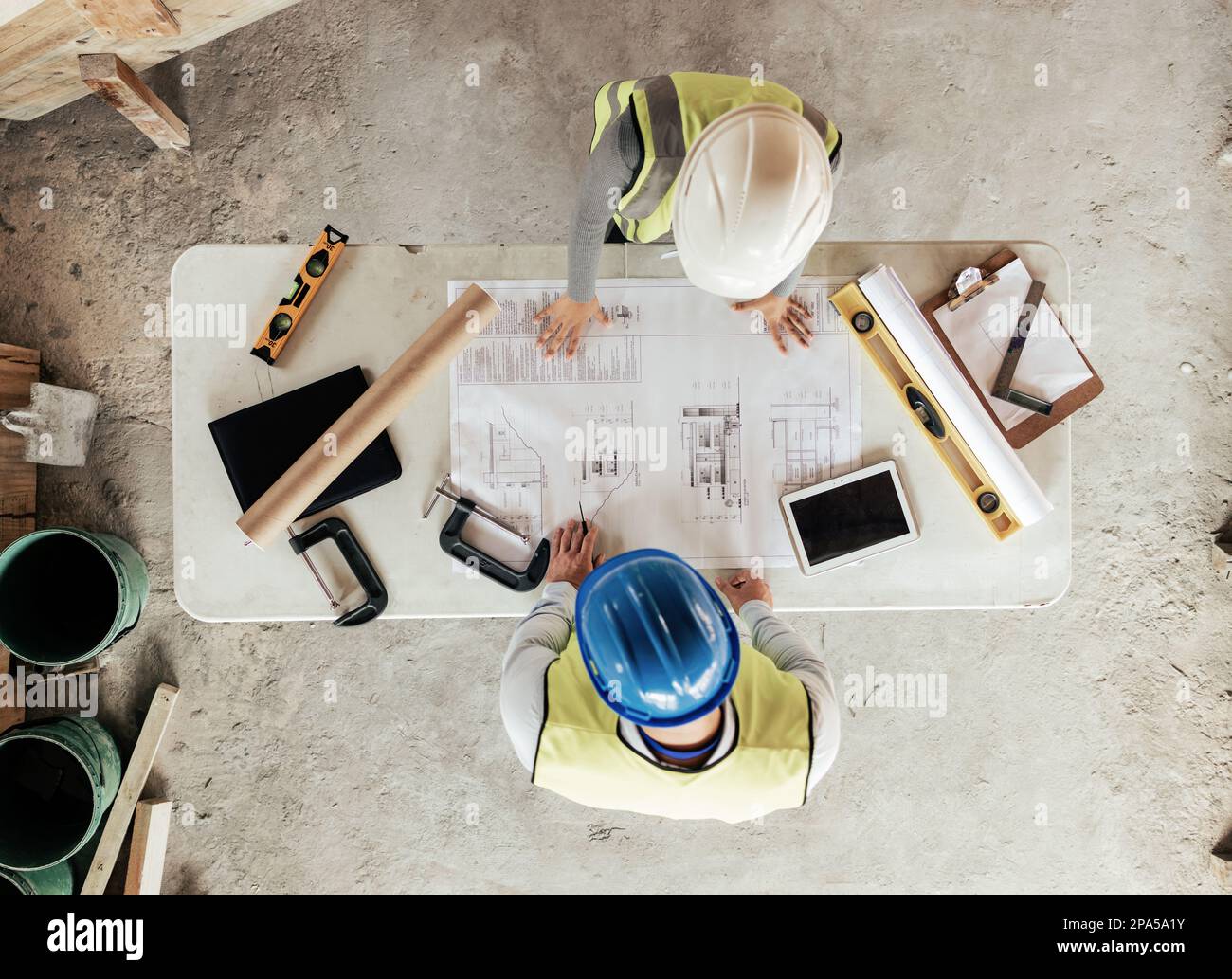 Architect, engineer and planning with blueprint, paper and ...