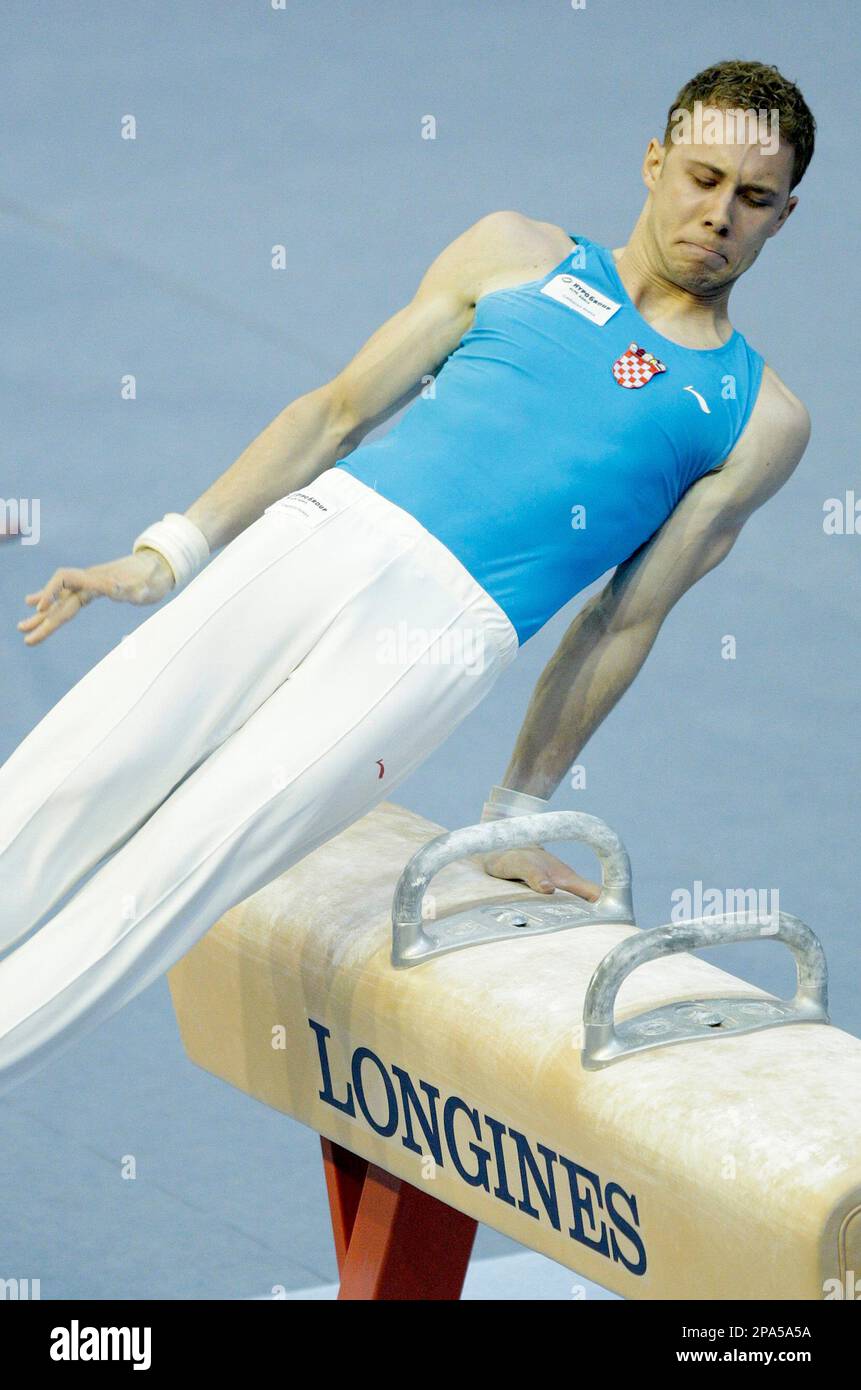 Robert Seligman from Croatia performs on the pommel horse during the ...