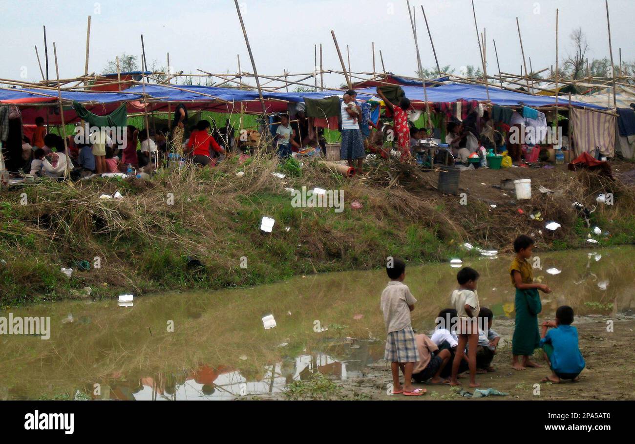 Myanmar residents who survived last week's destructive cyclone Nargis ...