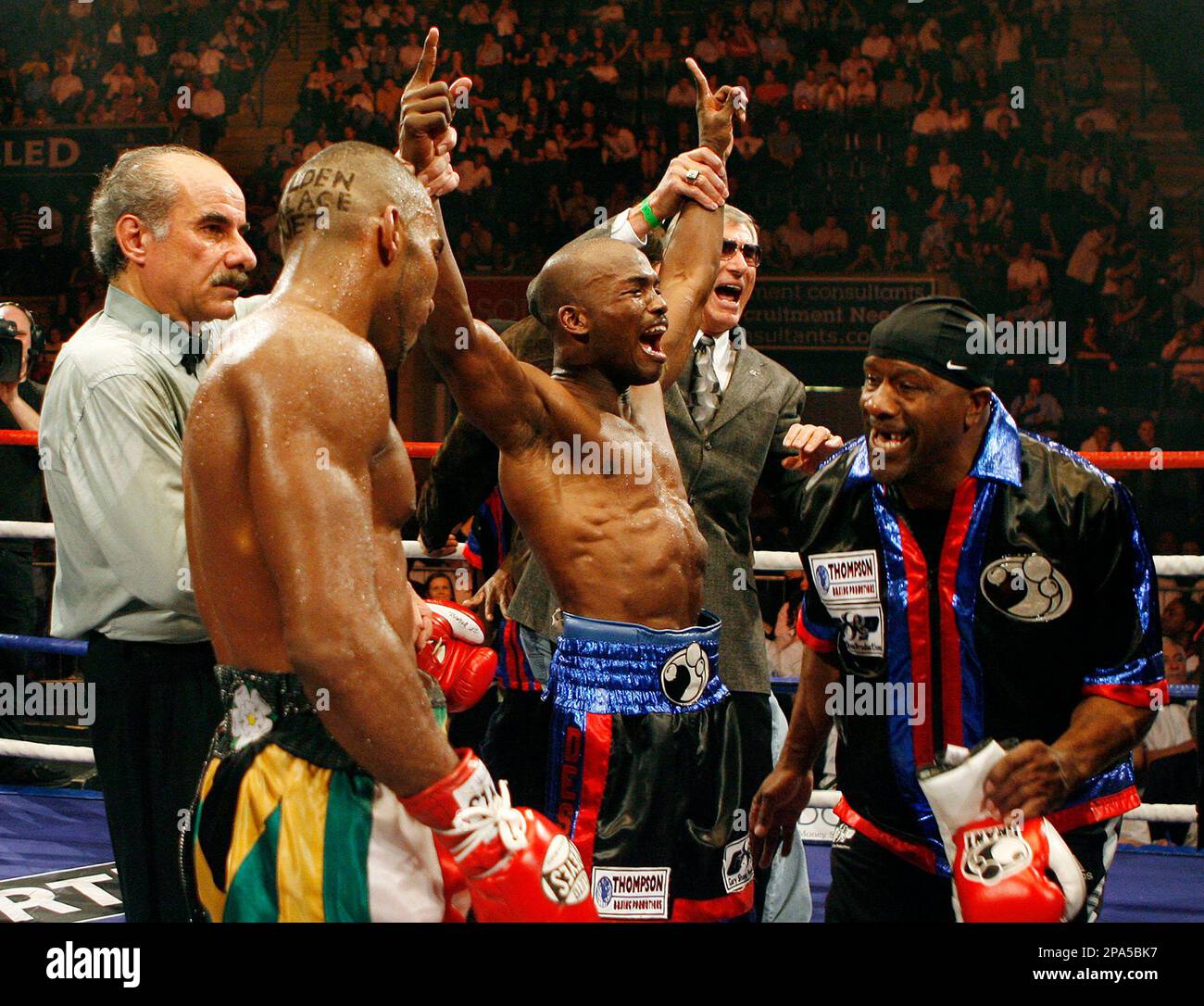 American boxer Timothy Bradley, center, celebrates after winning his ...
