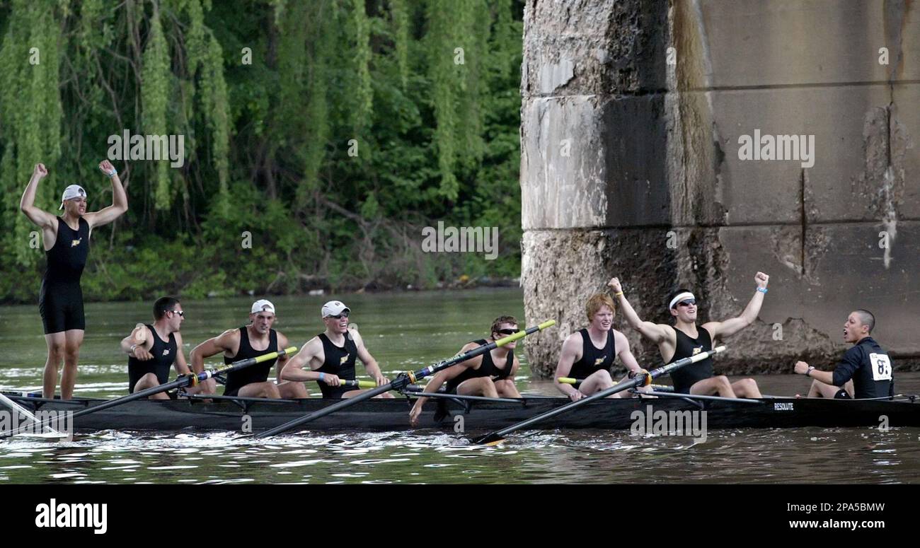 Members of Purdue's men's heavyweight eight crew team react after ...