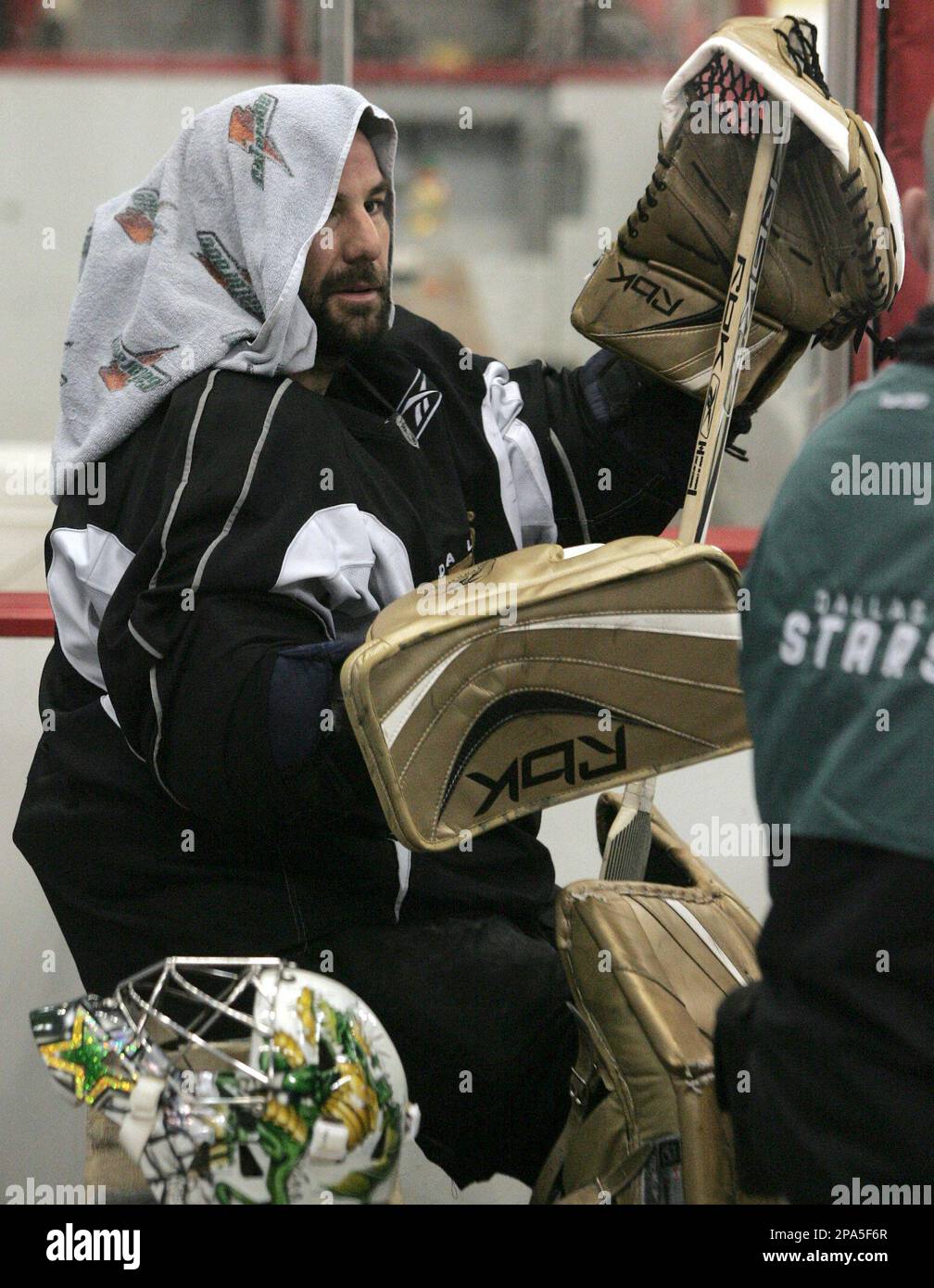 Dallas Stars goalie Marty Turco takes a breather during practice Friday ...