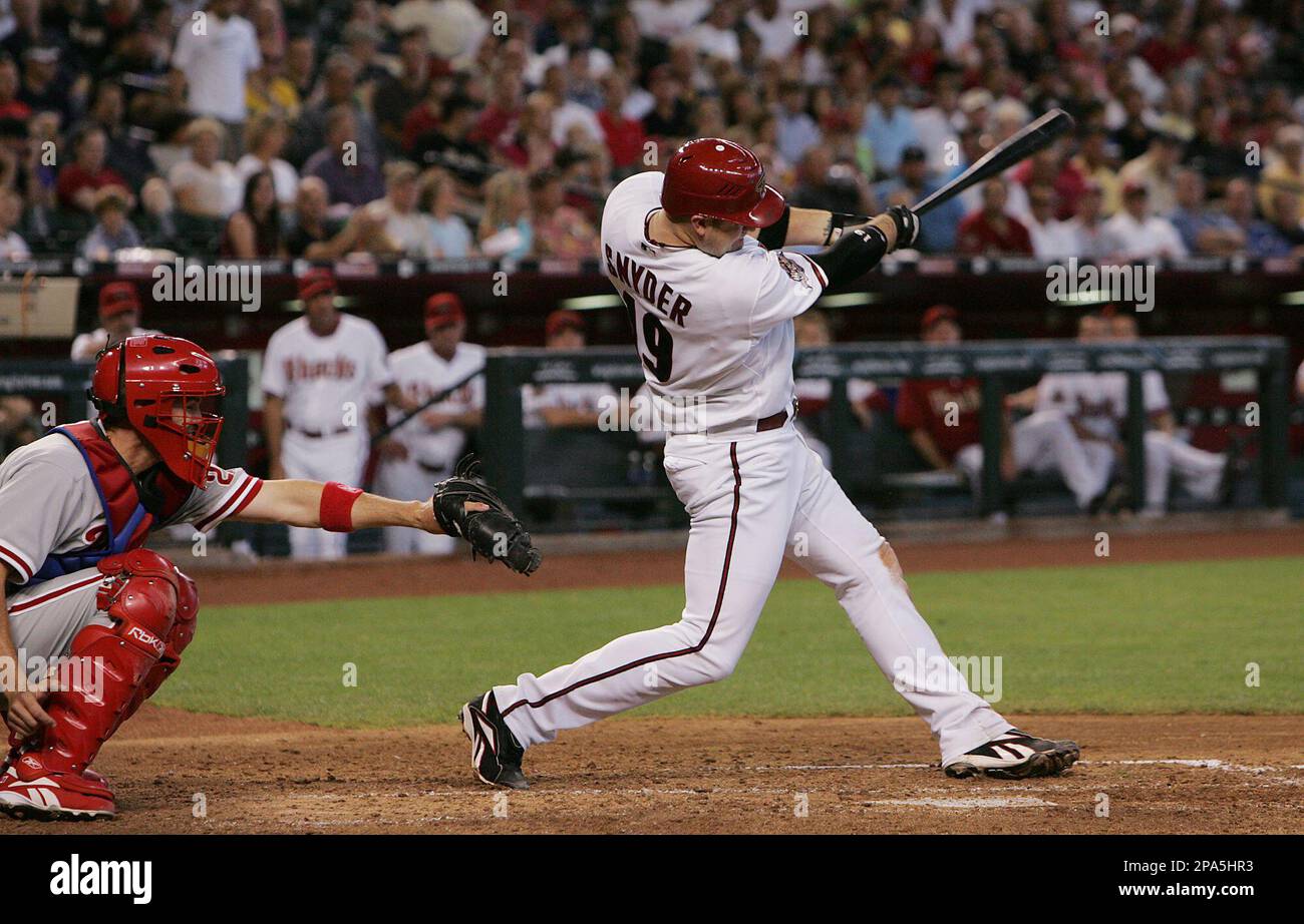 Arizona Diamondbacks' Chris Snyder, right, connects for a two-RBI ...