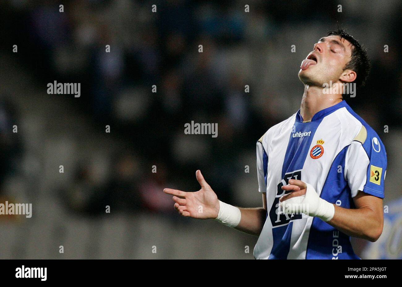 Espanyol player Albert Riera reacts against Athletico Madrid during a ...