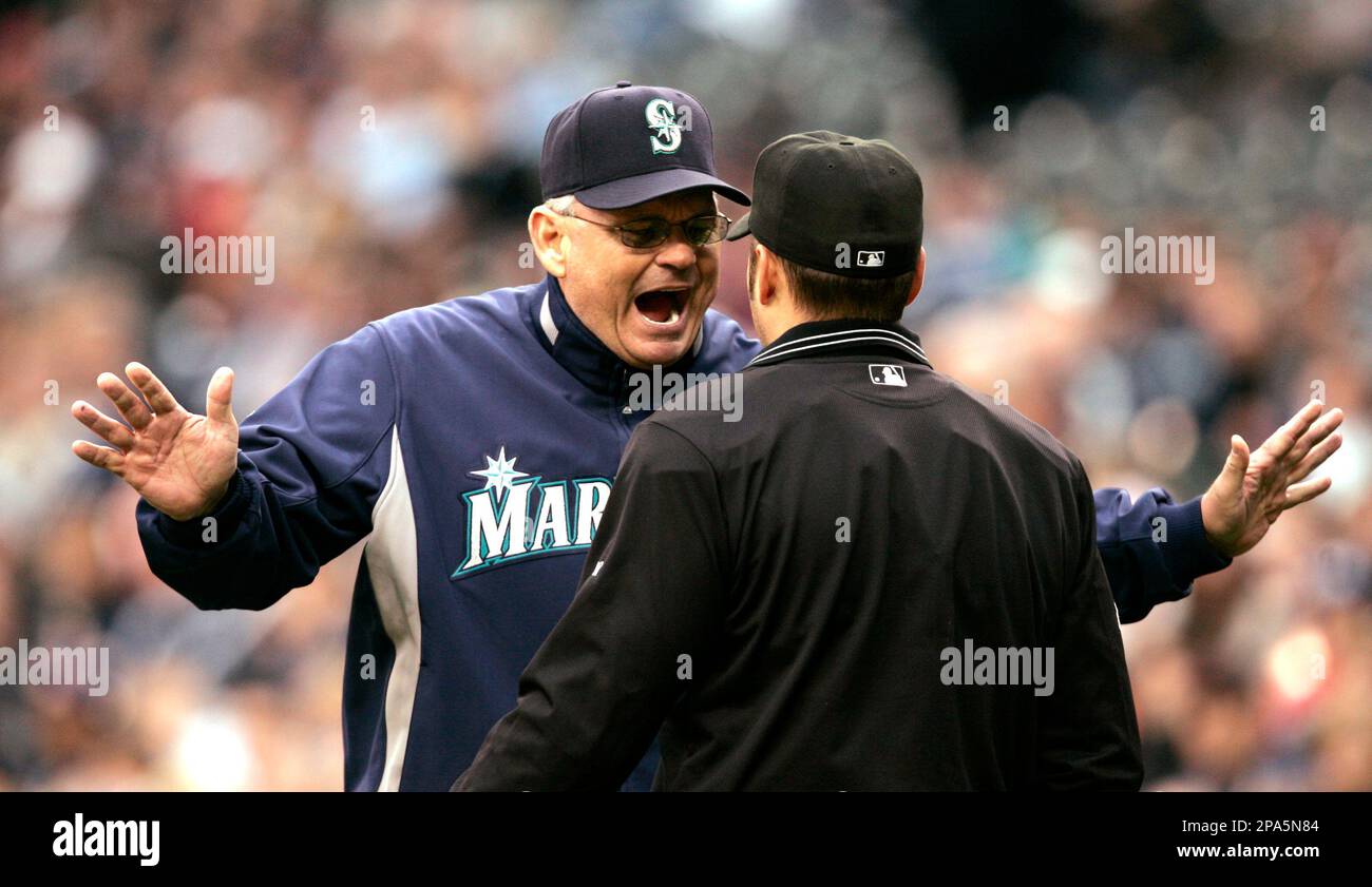 Seattle Mariners manager John McLaren, left, argues with plate umpire ...