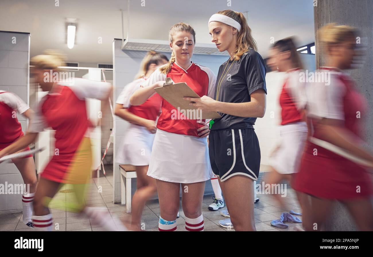 Sports, coaching and hockey with women in locker room for teamwork ...
