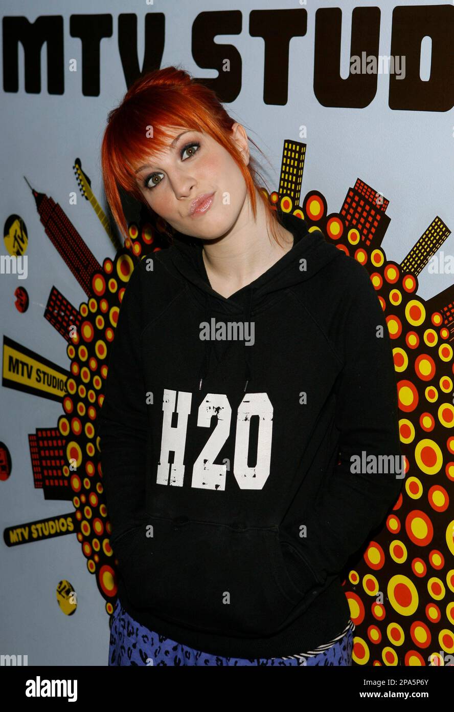 Hayley Williams, lead singer of the band Paramore, poses backstage ...