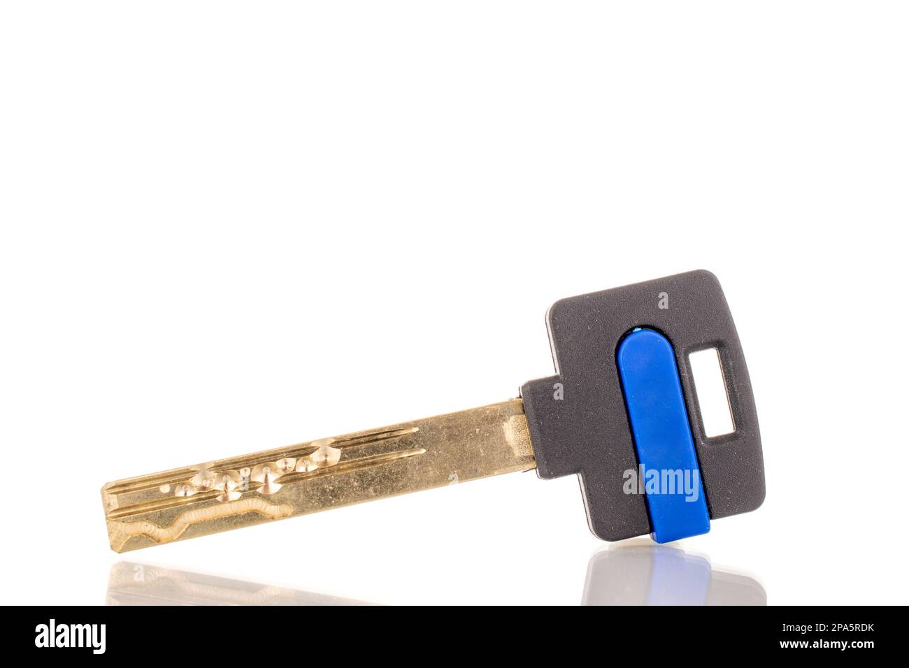 One metal door lock key, macro, isolated on white background Stock ...