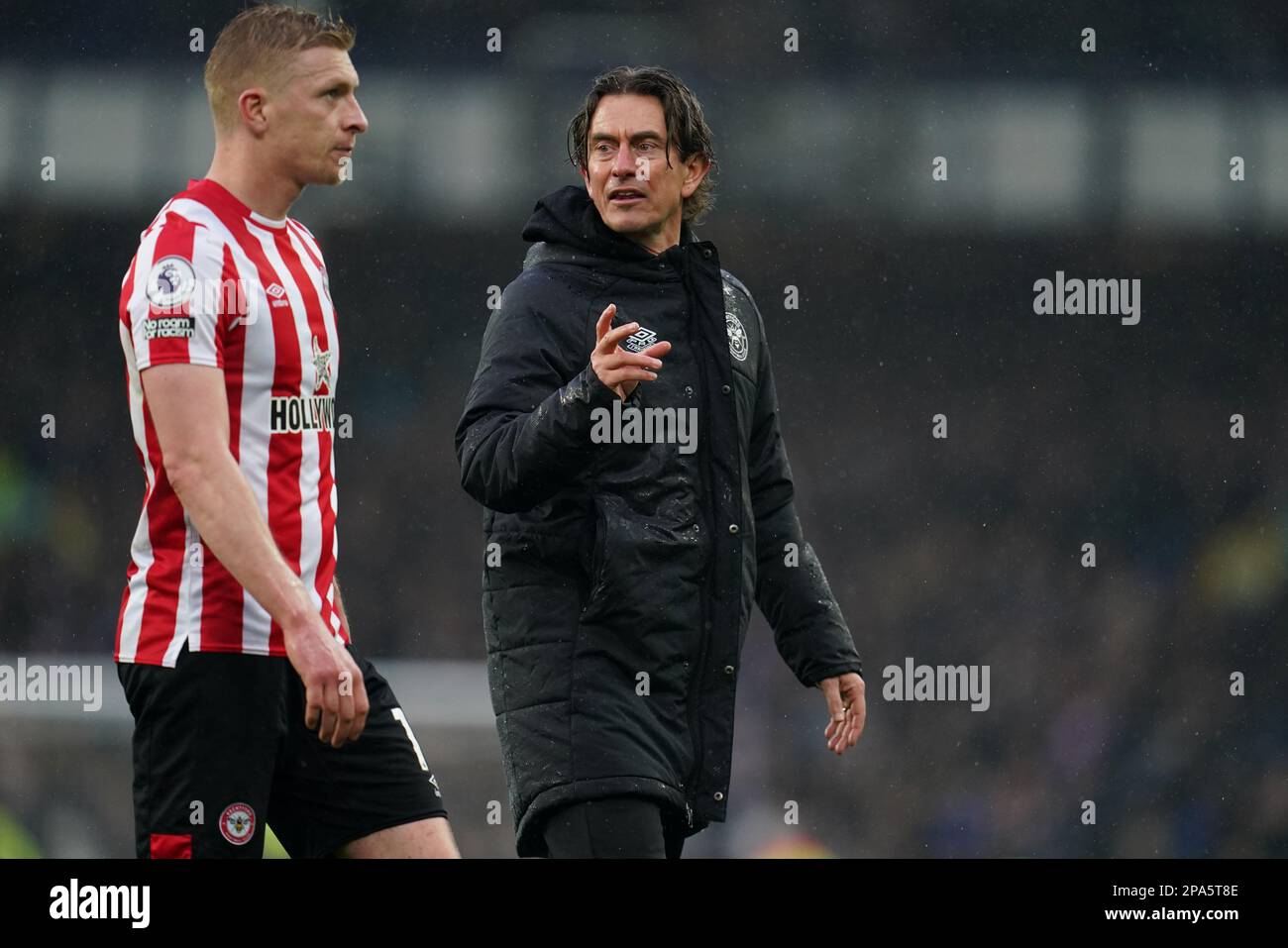 Brentford manager Thomas Frank (right) and Ben Mee after the Premier ...