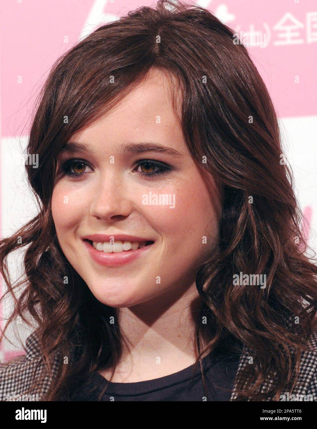 American actress Ellen Page smiles at photographers in Tokyo Wednesday ...
