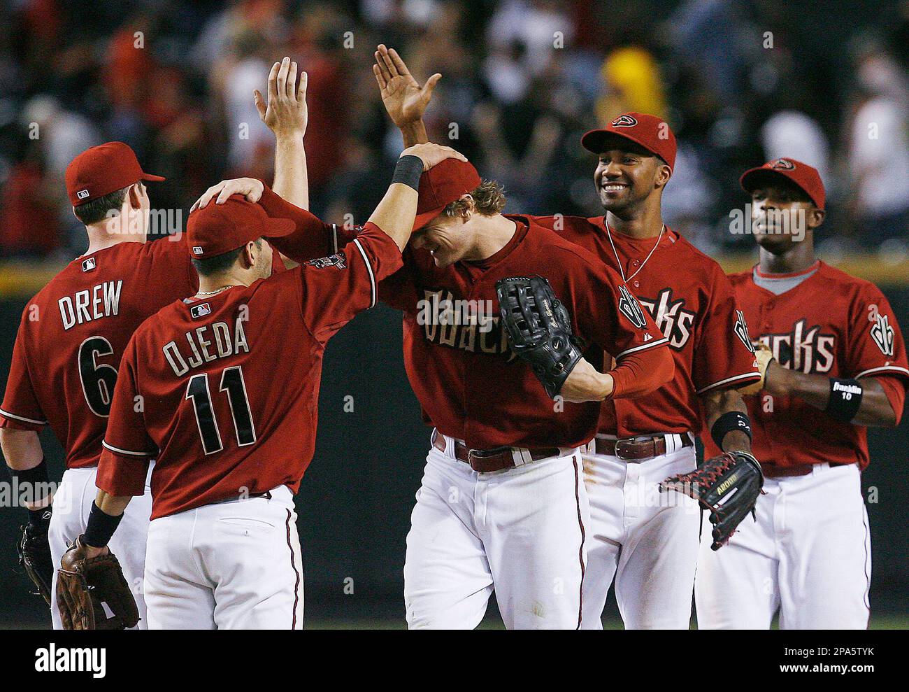 From left to right, Arizona Diamondbacks' Stephen Drew, Augie Ojeda ...