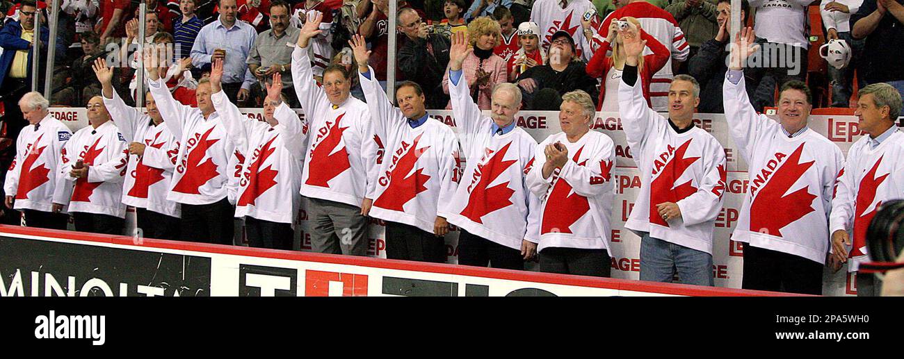 Players and coaches from the 1976 Canada Cup team salute the crowd in ...