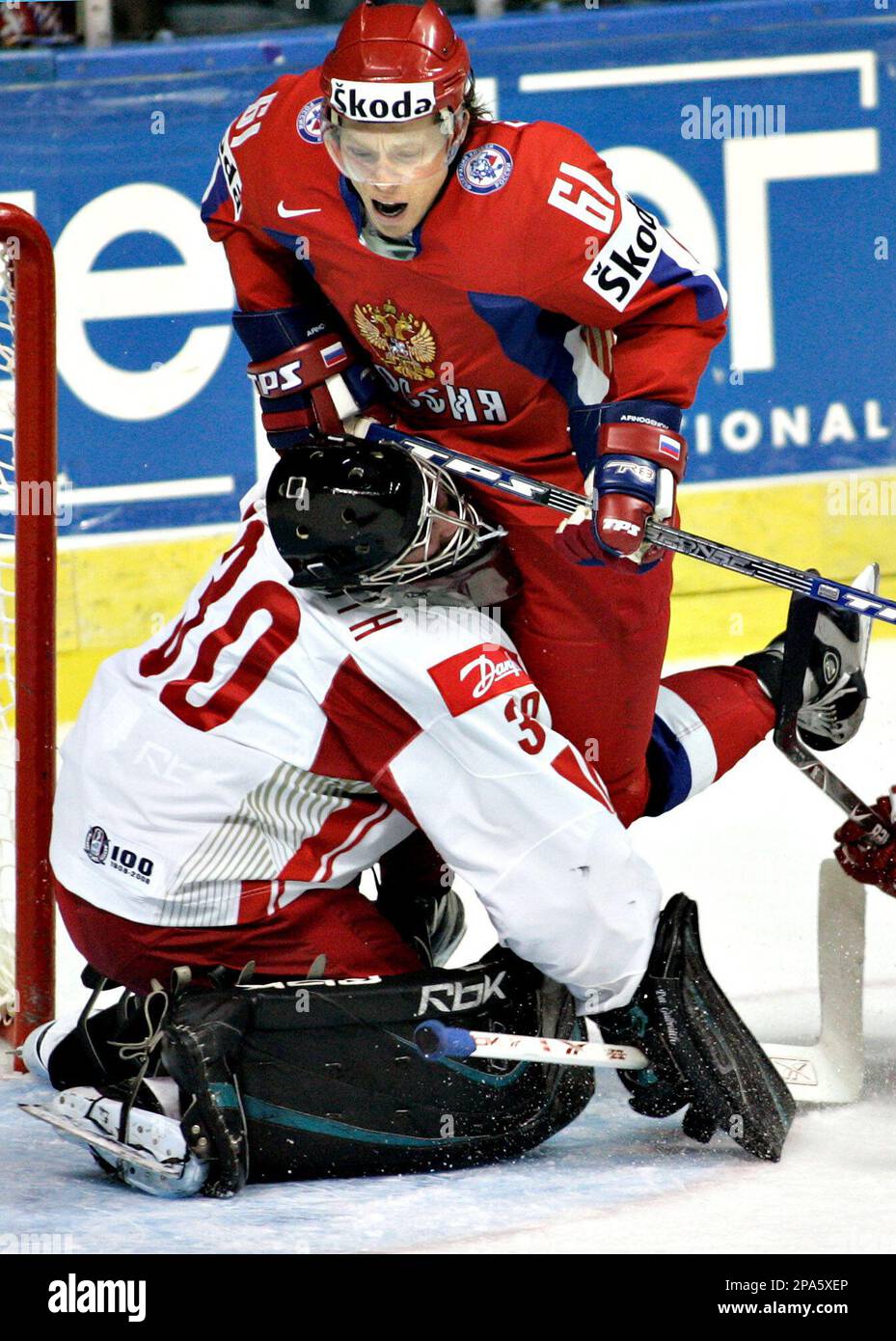 Russia forward Maxim Afinogenov collides with Denmark goalkeeper ...