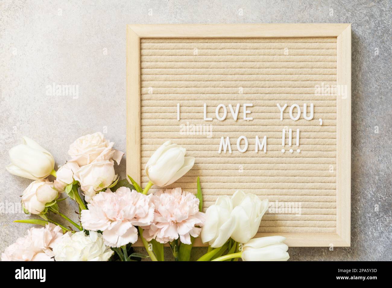Happy Mother's Day. Letter I LOVE MOM on letterboard and beautiful ...