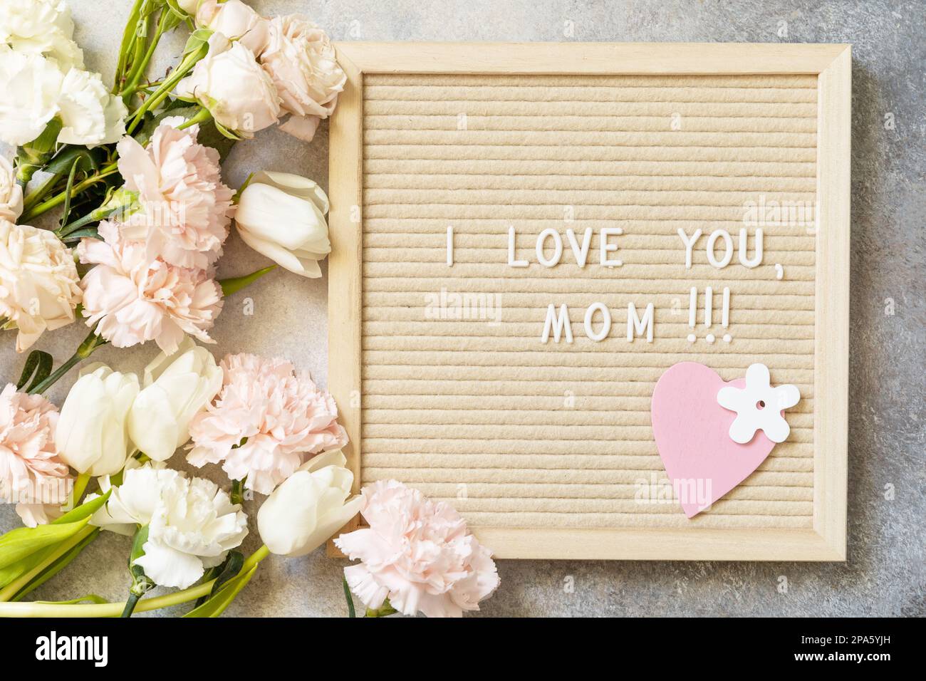 Happy Mother's Day. Letter I LOVE MOM with heart on letterboard and ...