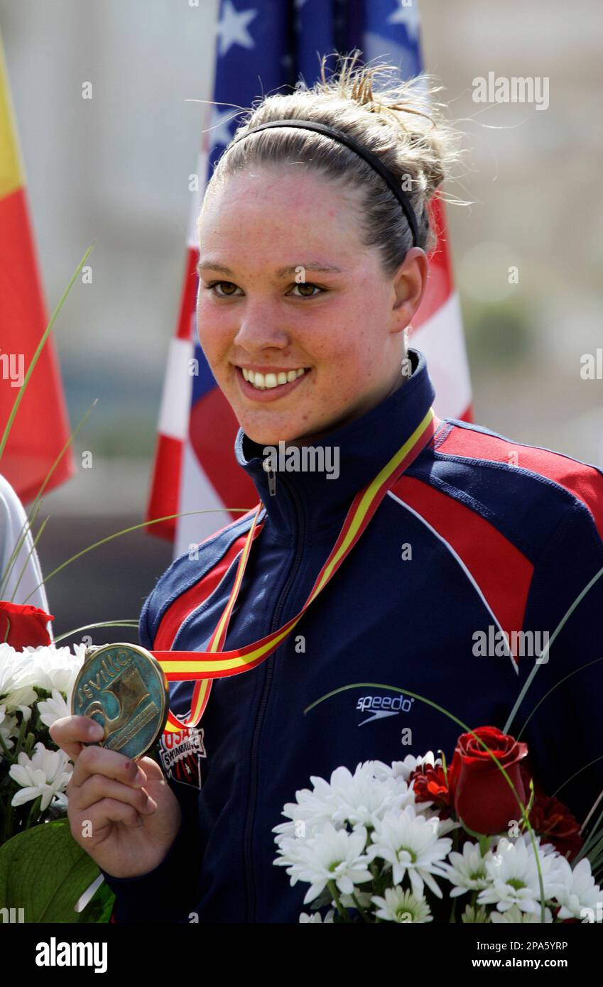 Chloe Sutton, from the US, displays her bronze medal for the 5 ...