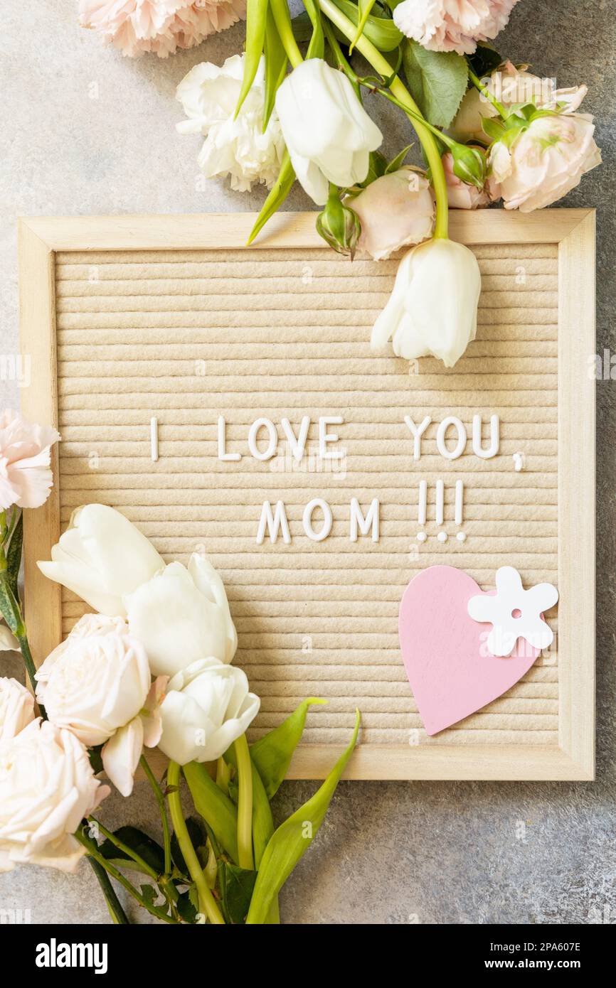 Happy Mother's Day. Letter I LOVE MOM with heart on letterboard and ...