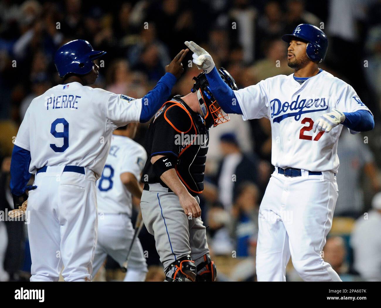 Los Angeles Dodgers Matt Kemp, right, is congratulated at home plate by ...