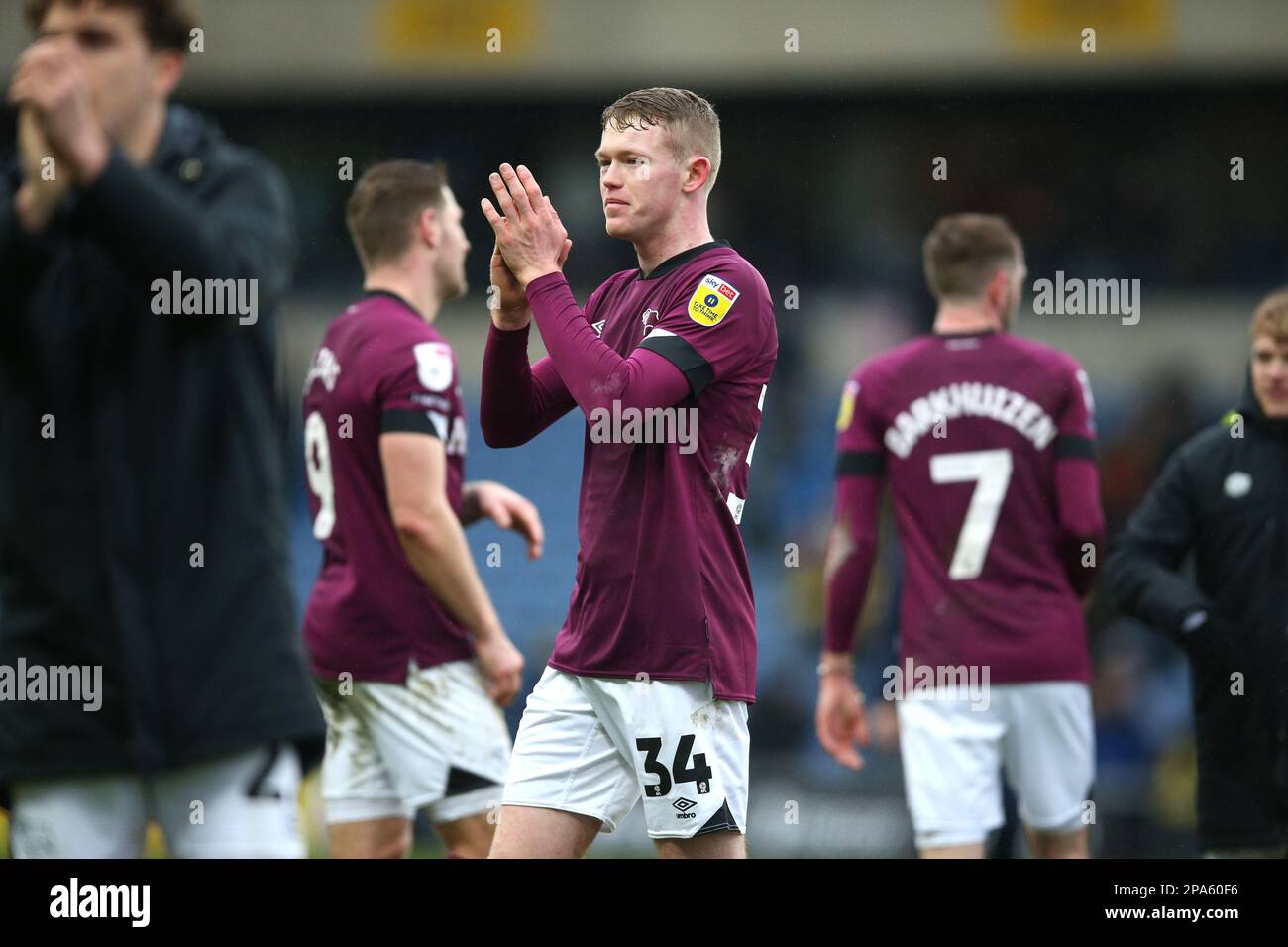 Derby County's Jake Rooney (centre) applauds the fans following the Sky ...