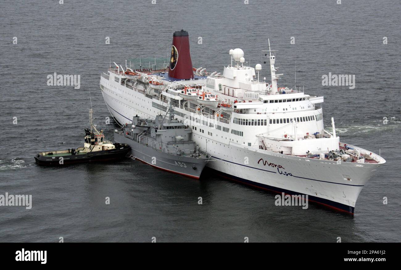 Passengers are evacuated from the stranded "Mona Lisa" cruise ship onto ...