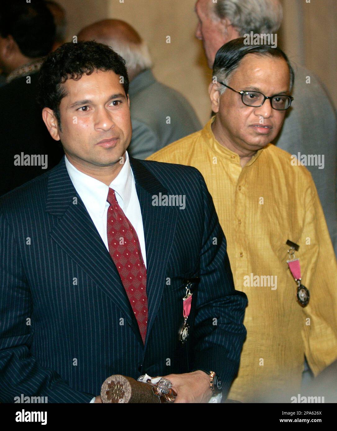 Founder of Infosys Technologies,N.R. Narayana Murthy, right, is seen ...