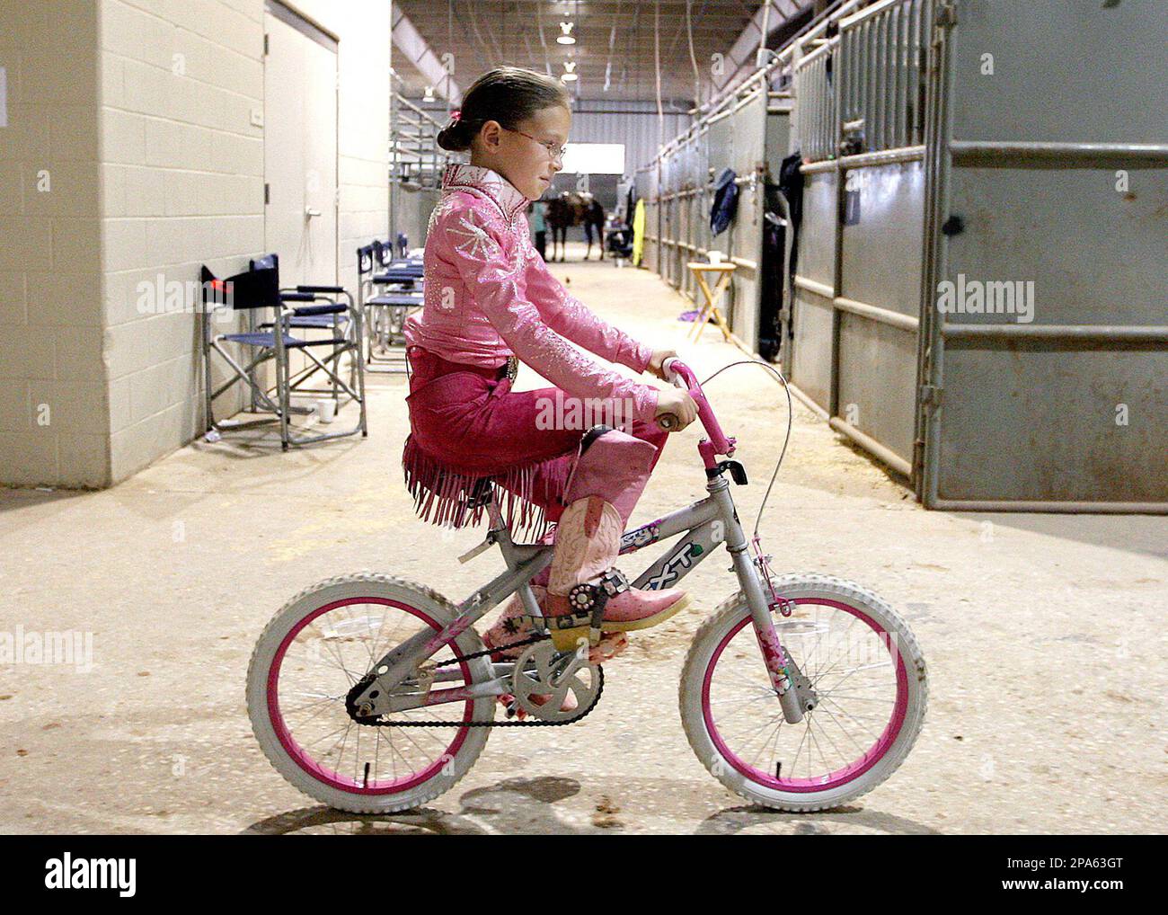 Dressed in her western attire down to the pink boots, Erin Griffin, 8 ...