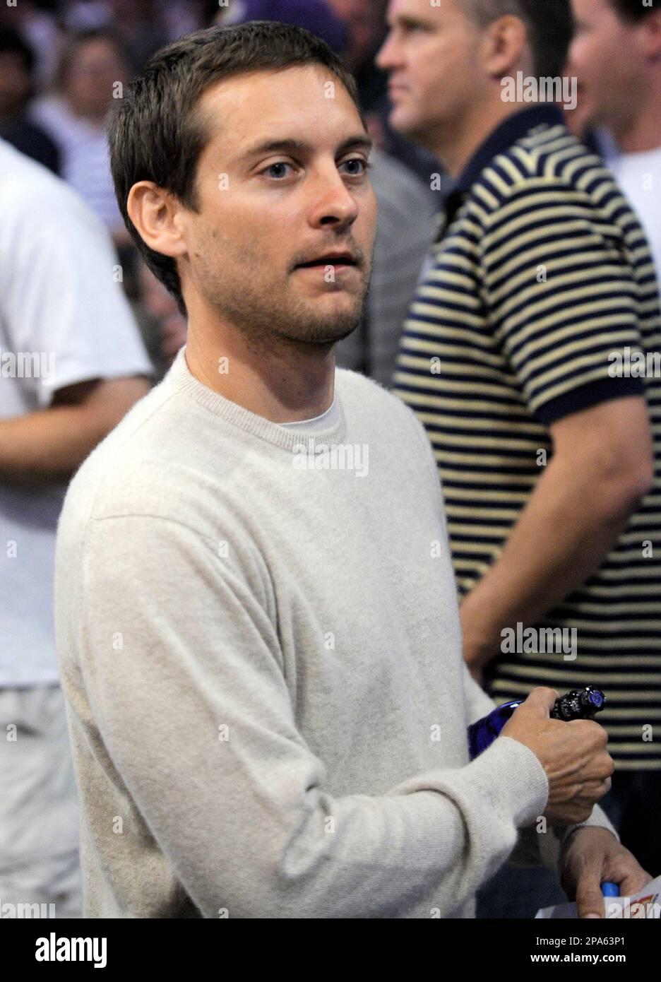 Actor Tobey Maguire arrives to see the Los Angeles Lakers play the Utah ...