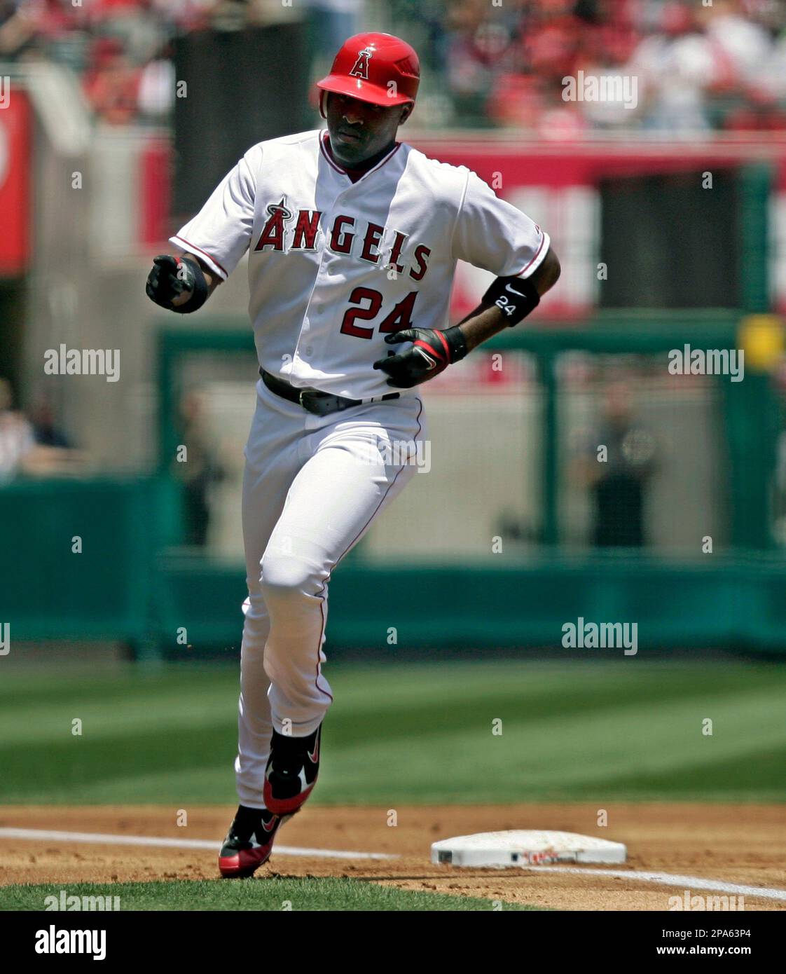Los Angeles Angels' Gary Matthews rounds the bases after hitting a home ...