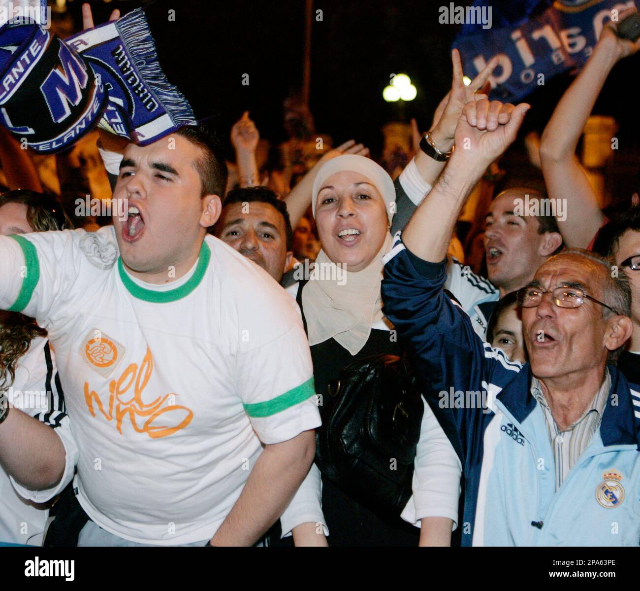 Real Madrid soccer fans celebrate in the Plaza de Cibeles in Madrid ...