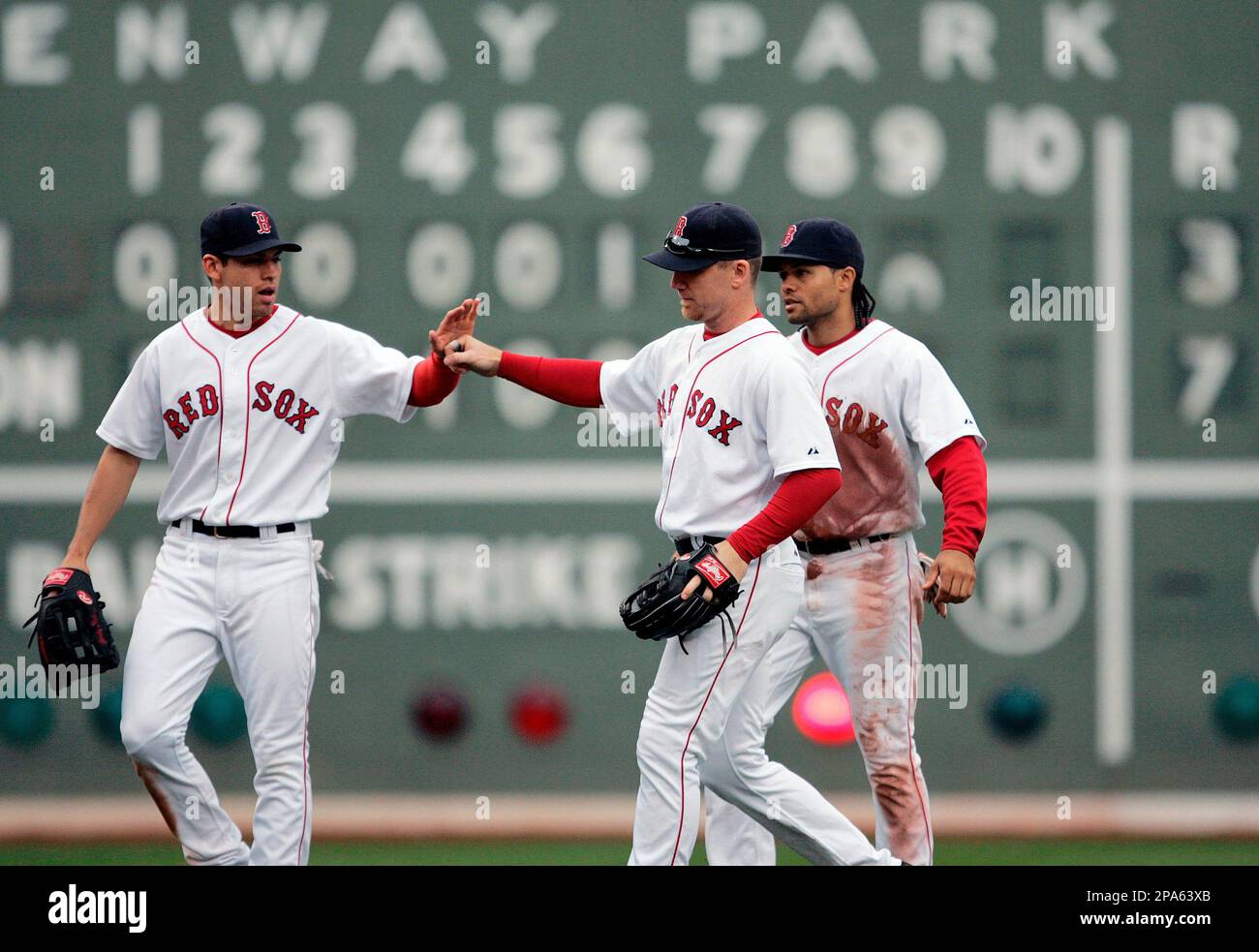 Boston Red Sox's Jacoby Ellsbury, left, J.D. Drew, center, and Coco ...