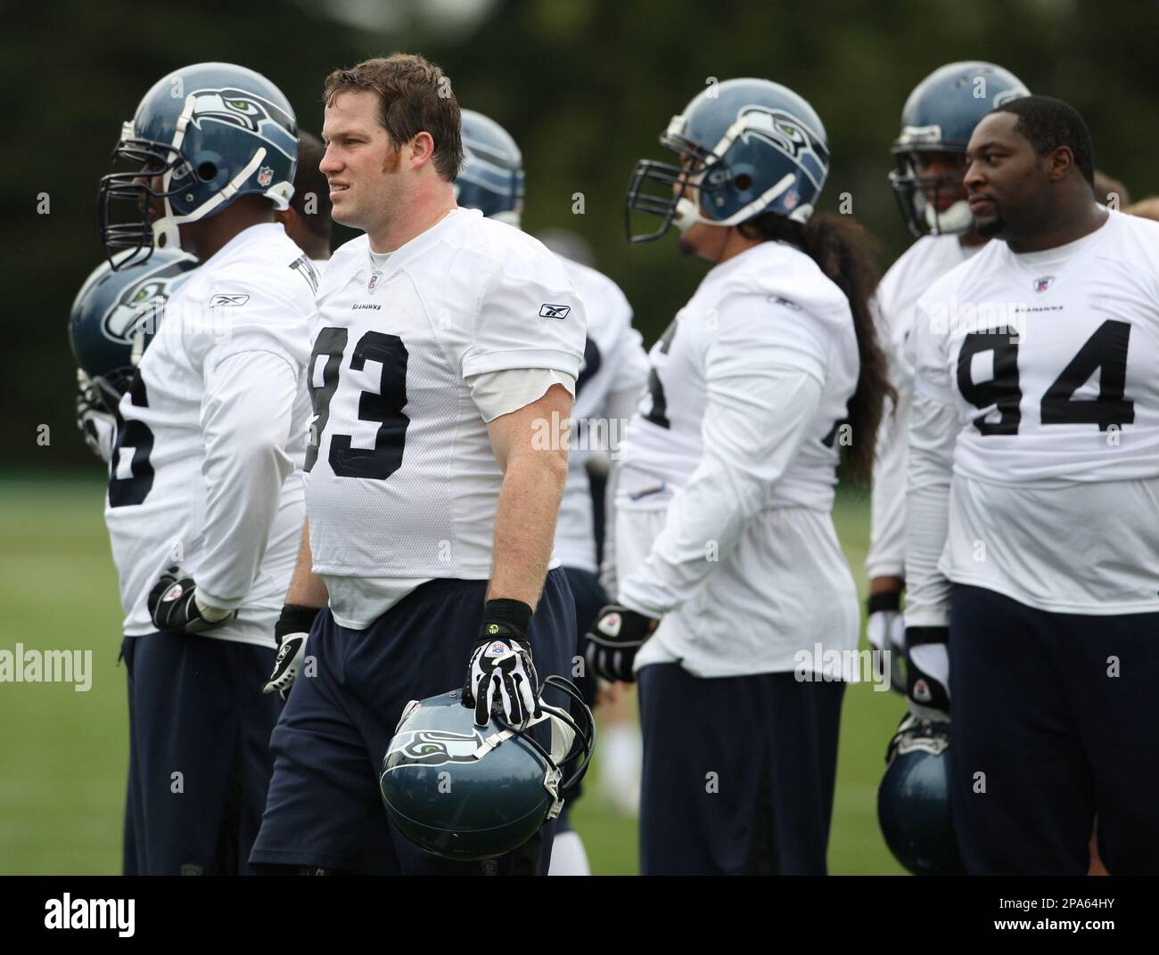 Seattle Seahawks' defensive lineman Craig Terrill, left helmet off ...