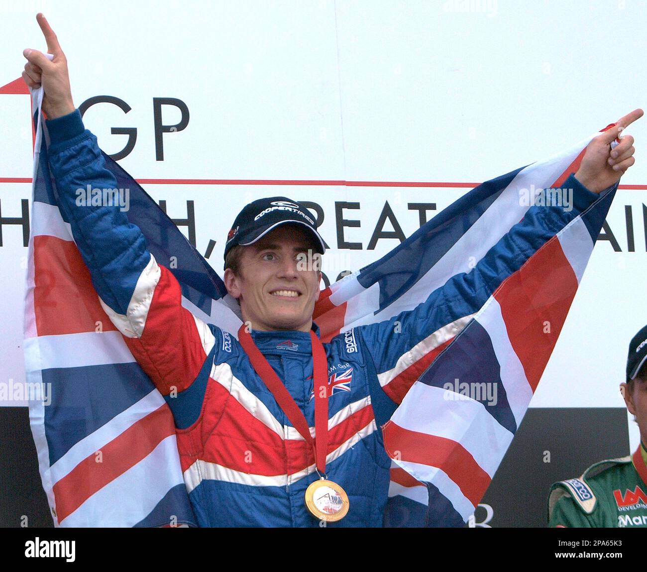 Great Britain's Robbie Kerr celebrates on the podium winning the A1GP ...