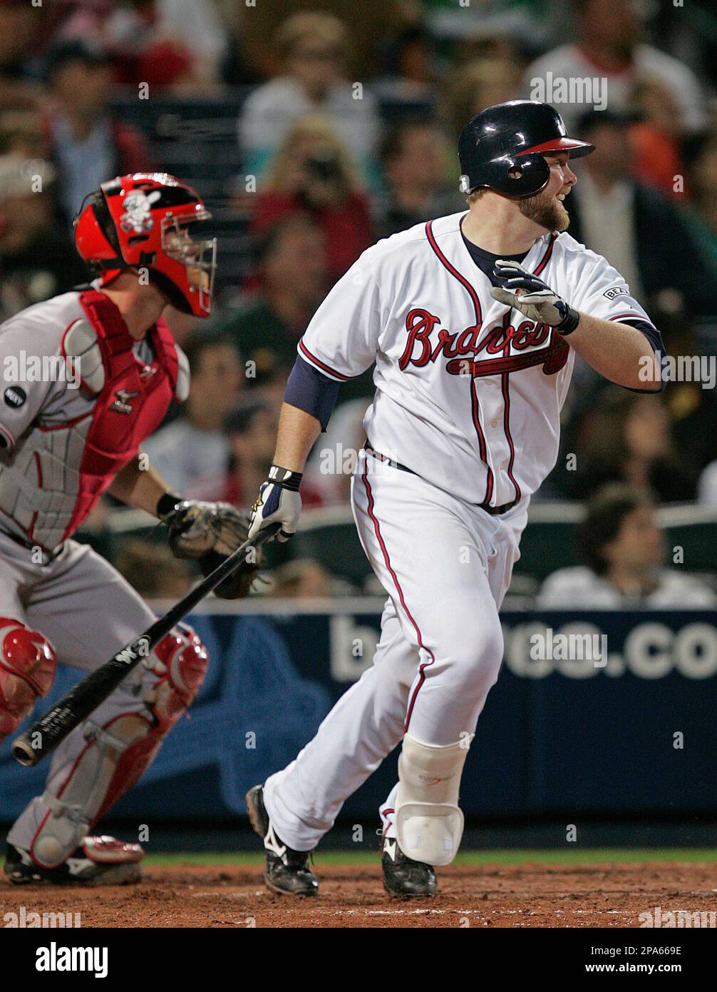 Atlanta Braves Brian McCann follows through with a three-run double as ...