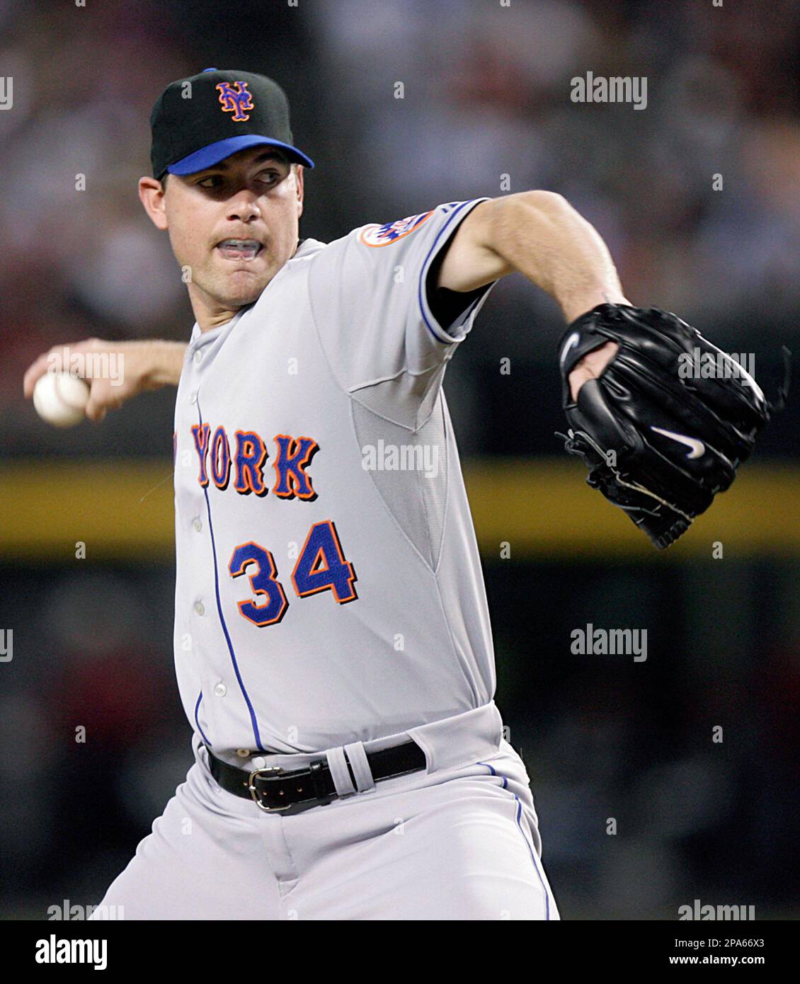 New York Mets starter Mike Pelfrey delivers a pitch to Arizona ...